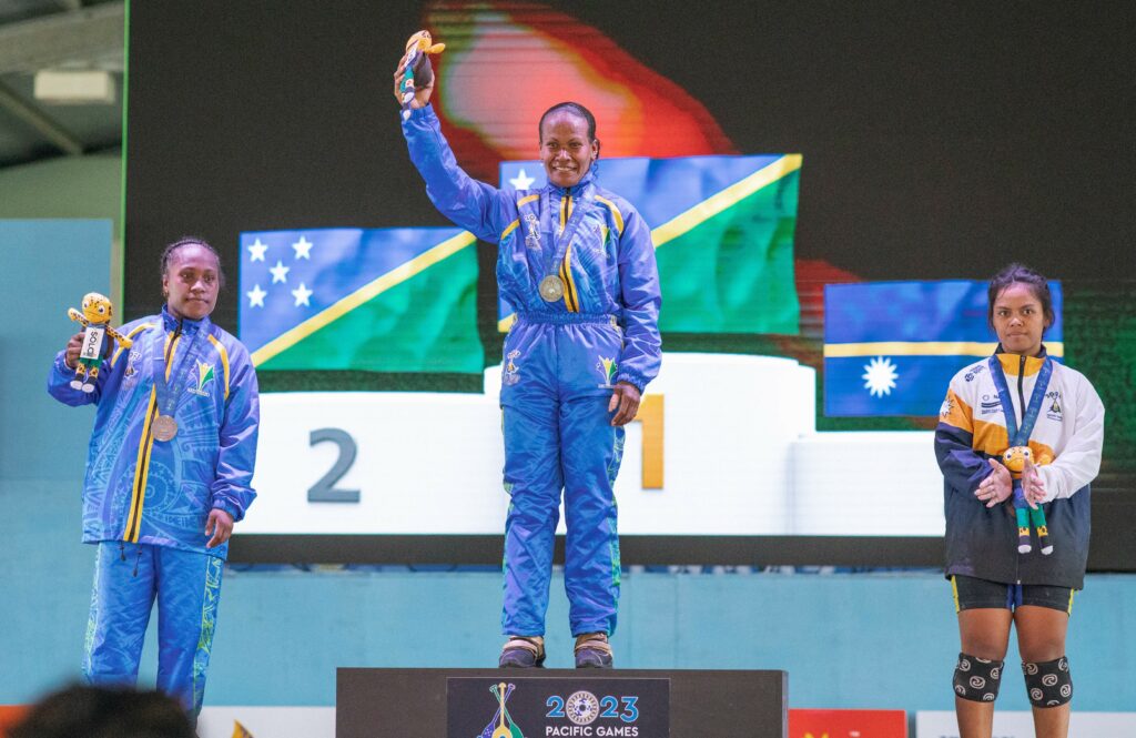 SOL23: Golden hat-trick for Wini on day 1 of weightlifting - Pasifika TV